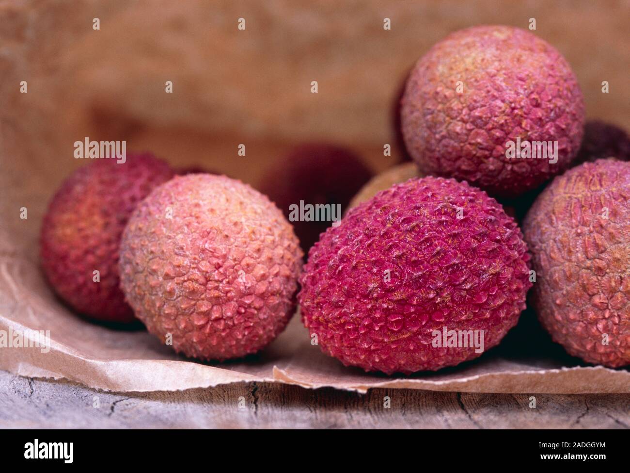 Lychee fruit (Litchi chinensis) in a brown paper bag Stock Photo - Alamy