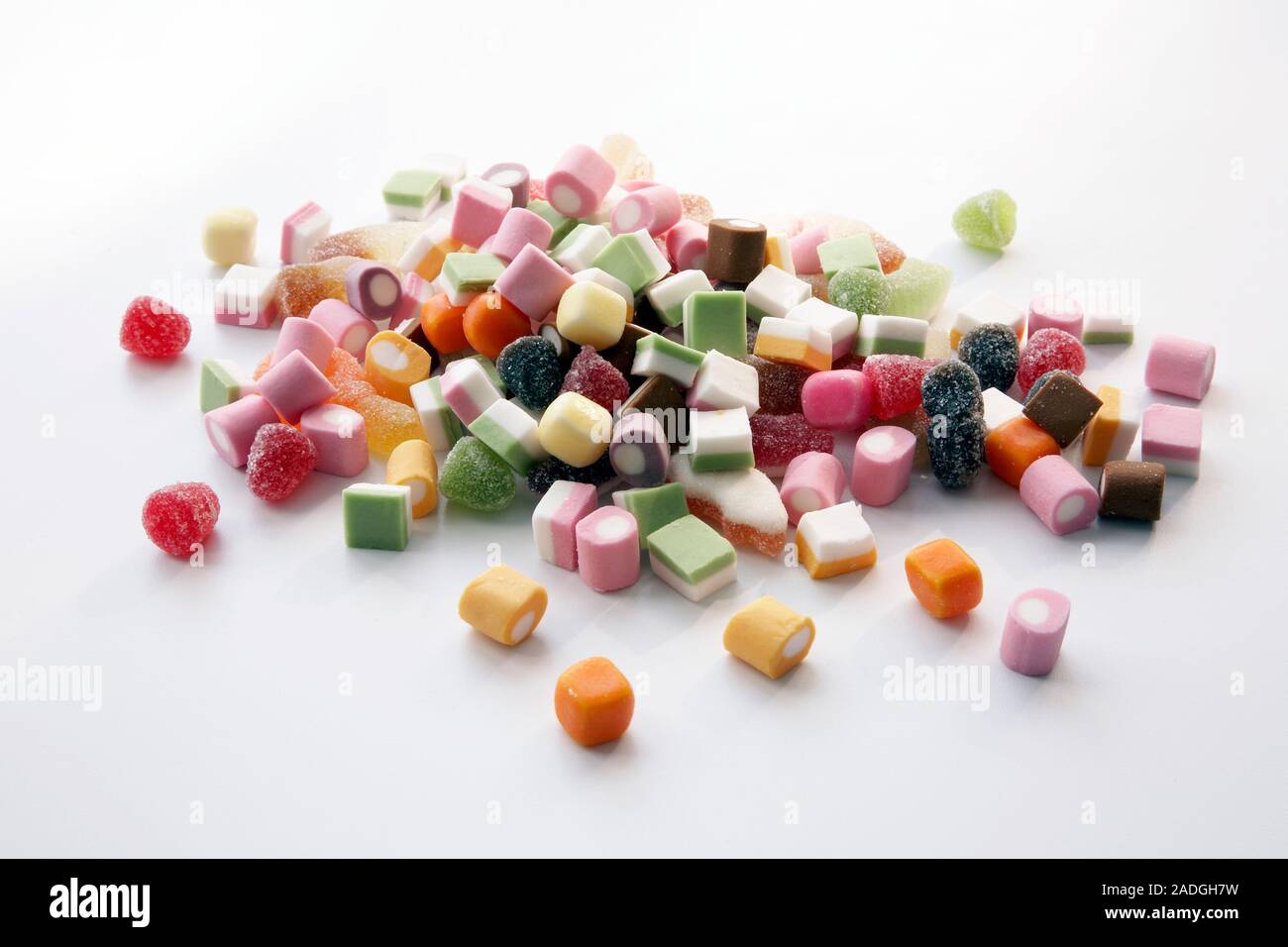 Sweets. Pile of assorted jellied and foam sweets on a surface Stock ...
