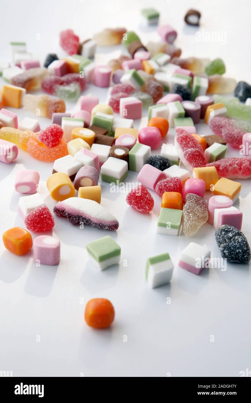 Sweets. Pile of assorted jellied and foam sweets on a surface Stock ...