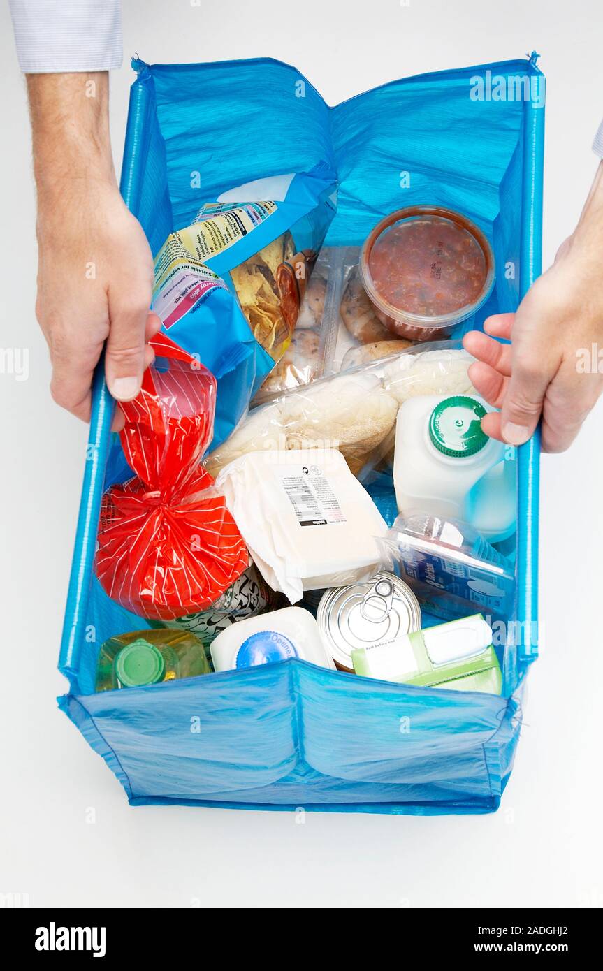 Packaged food in a reuseable shopping bag Stock Photo - Alamy