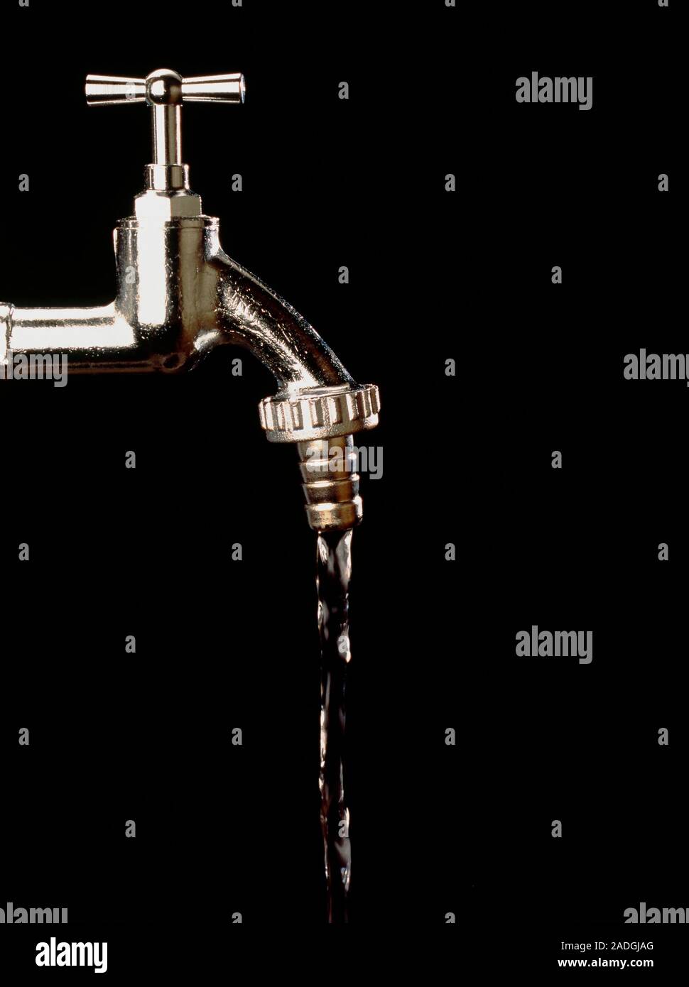 Tap water. Side view of a household tap with flowing water Stock Photo ...