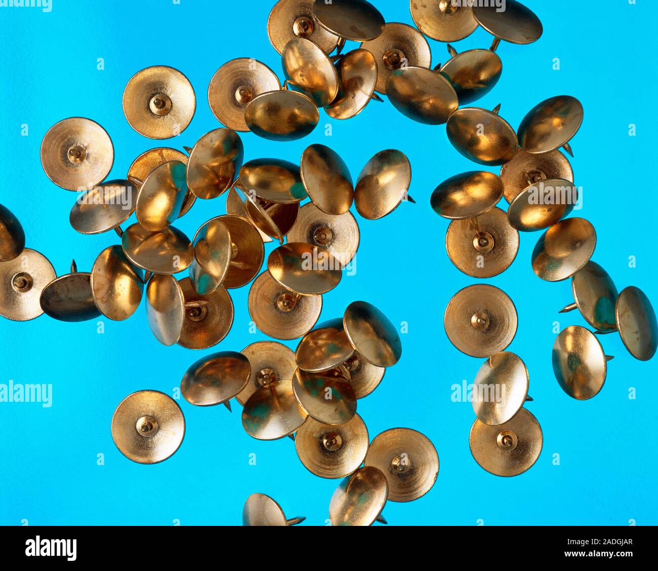 Drawing pins. Scattered drawing pins Stock Photo - Alamy