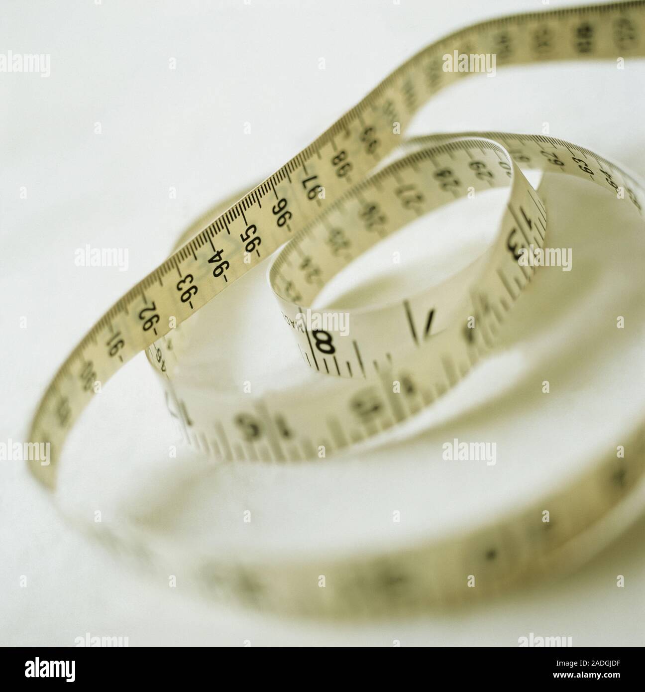 Tape measure. It is graduated in centimetres on one side and inches on ...