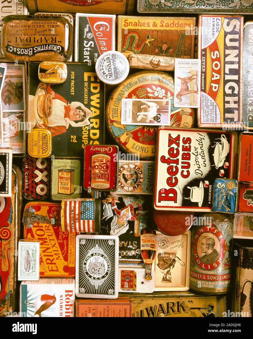 Assorted packaging labels. Colourful collection of tins and boxes for a ...