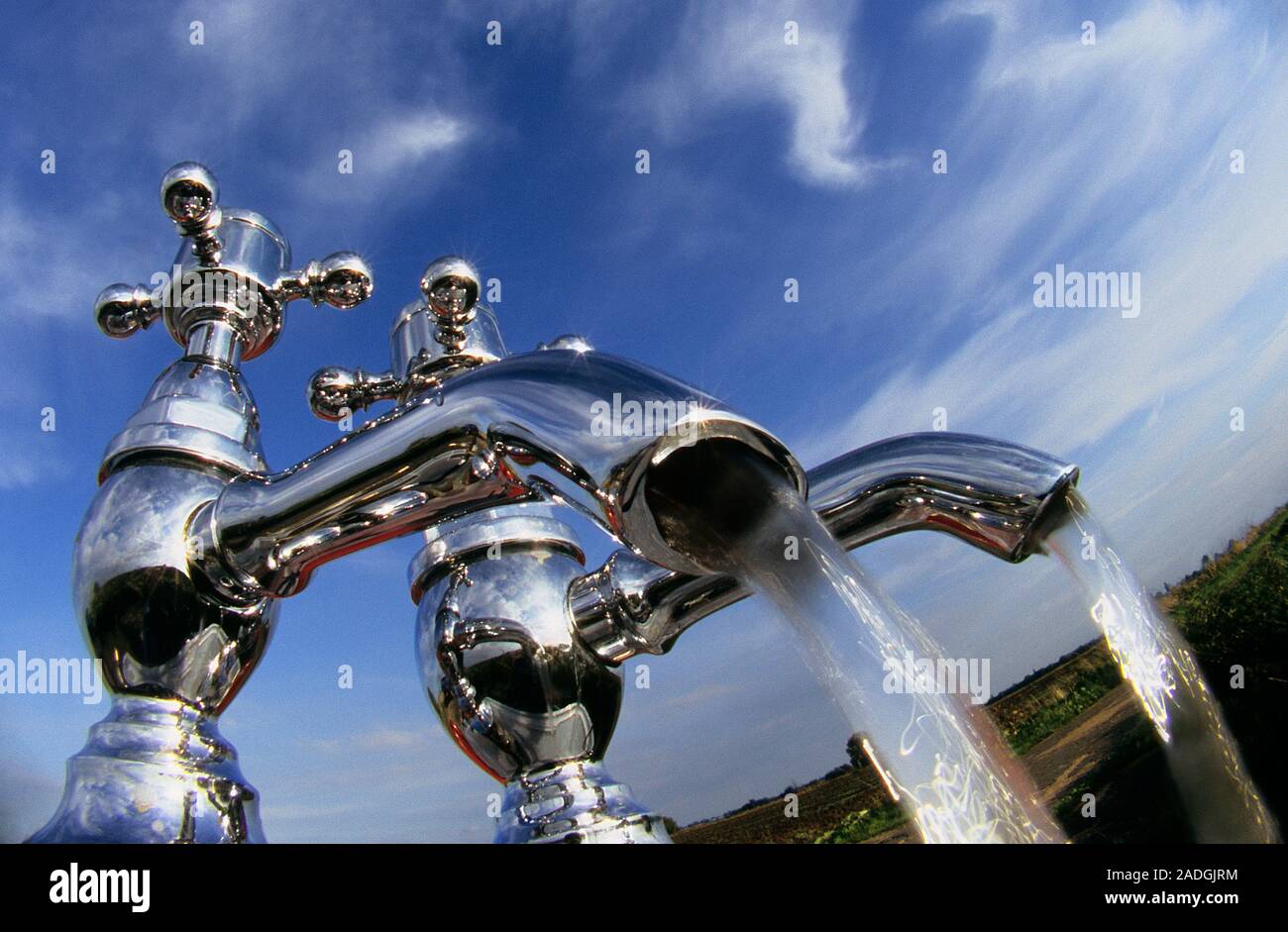 Running water from taps Stock Photo - Alamy