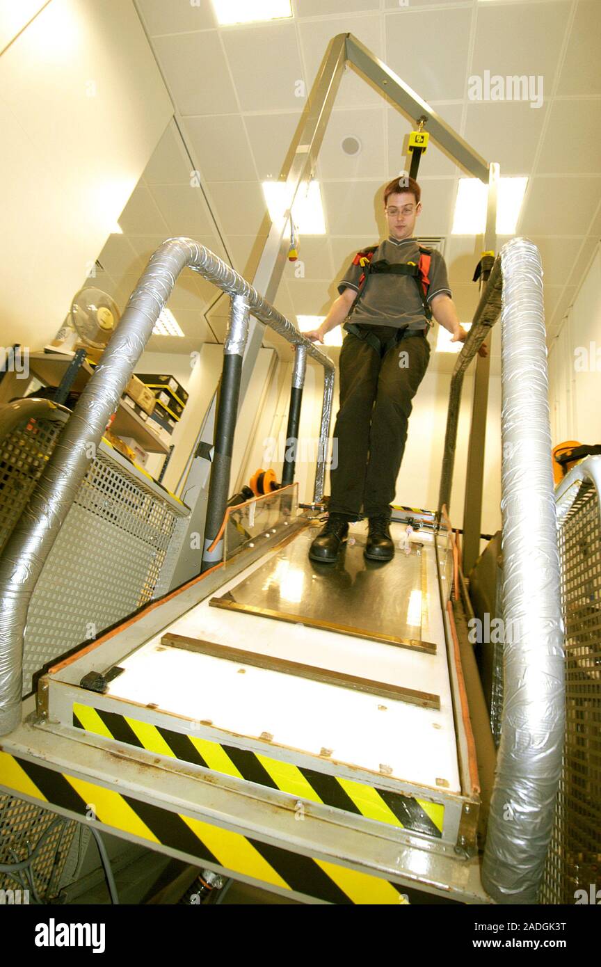 Friction test for shoes. The tester is walking down a smooth slope ...