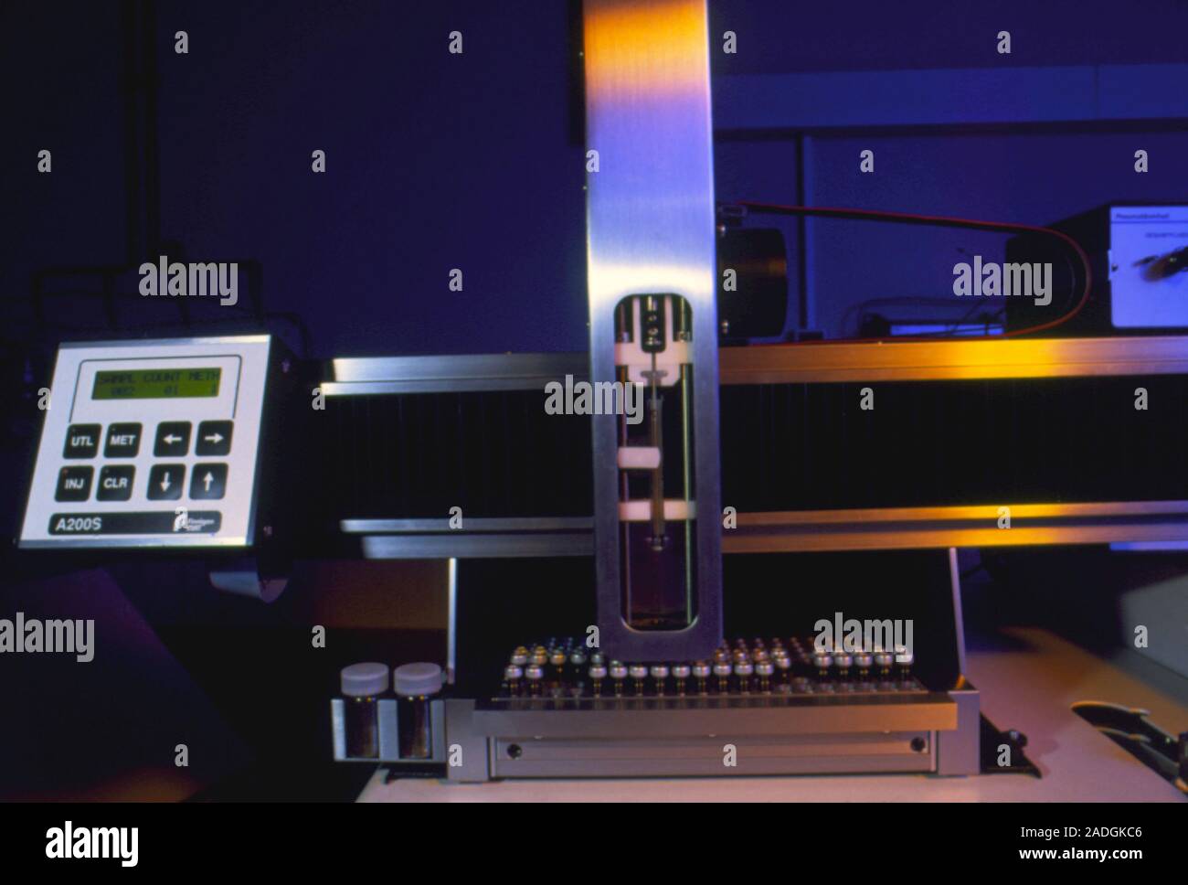 Forensic drug detection. A sample injection robot on a forensic gas ...