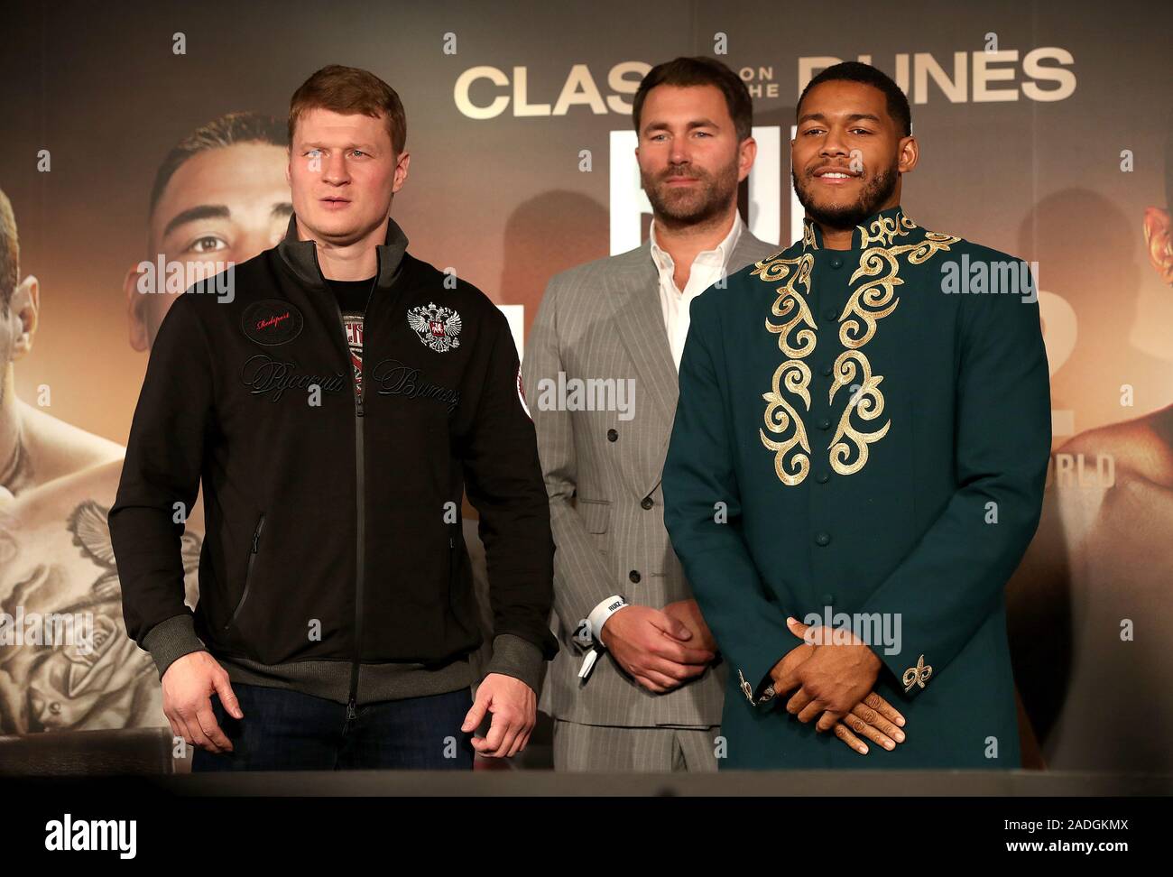Alexander Povetkin (left), boxing promoter Eddie Hearn (centre) and ...