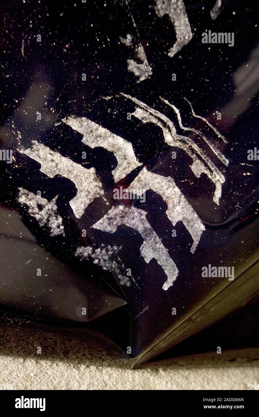 Lifted footprint. Dust residue lifted from a crime scene on a ...