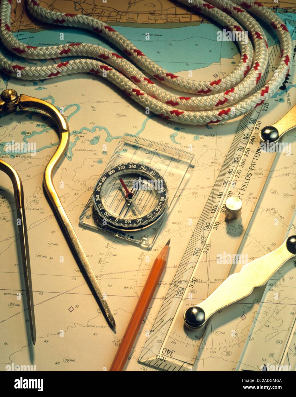 Navigational sailing equipment on a nautical chart. At left are some ...