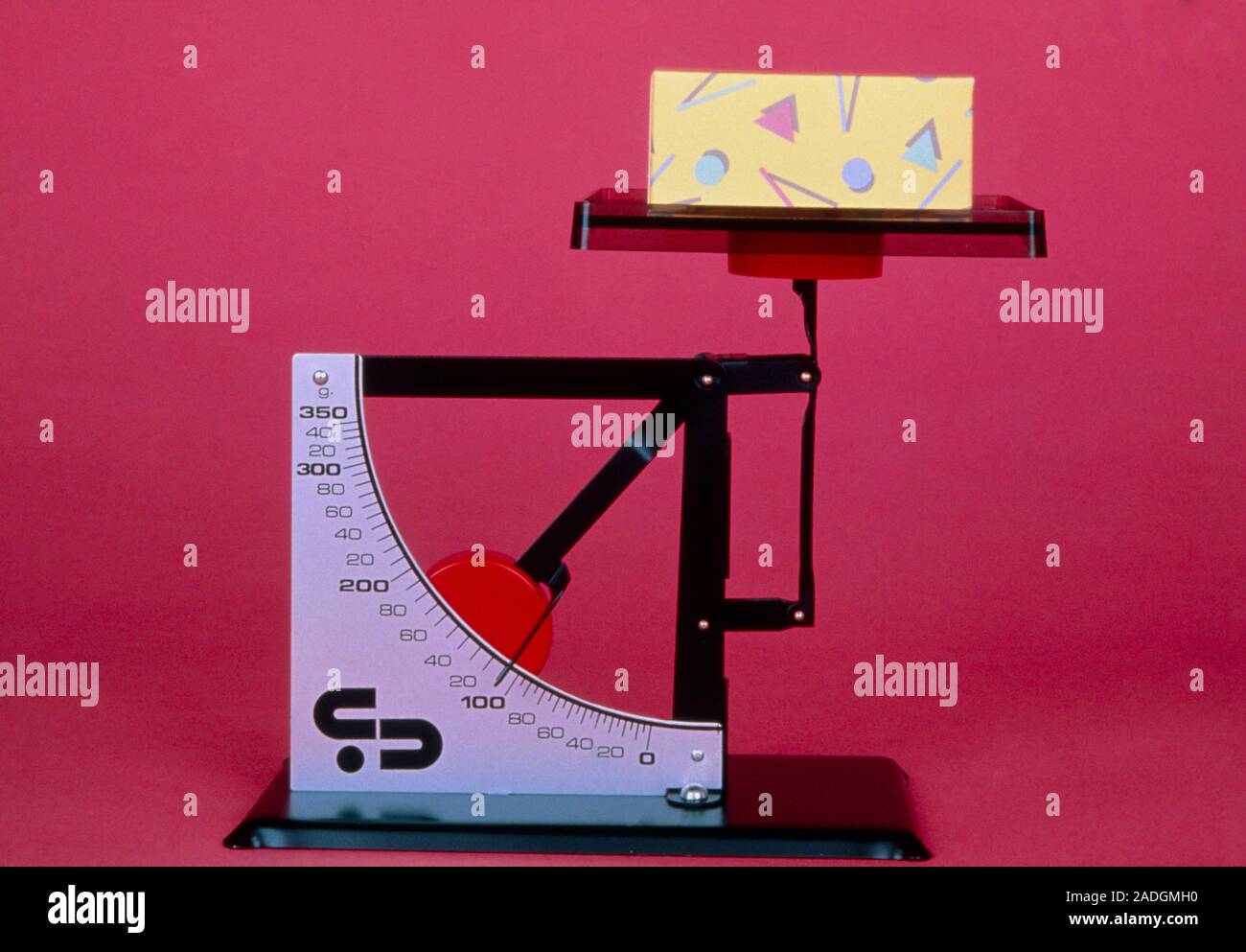 Lever balance. When a mass is placed on the pan, it exerts a downward ...