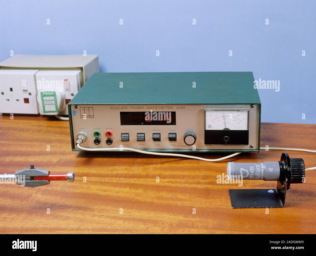 Geiger-Muller tube. Experiment with a radioactive source (lower left ...