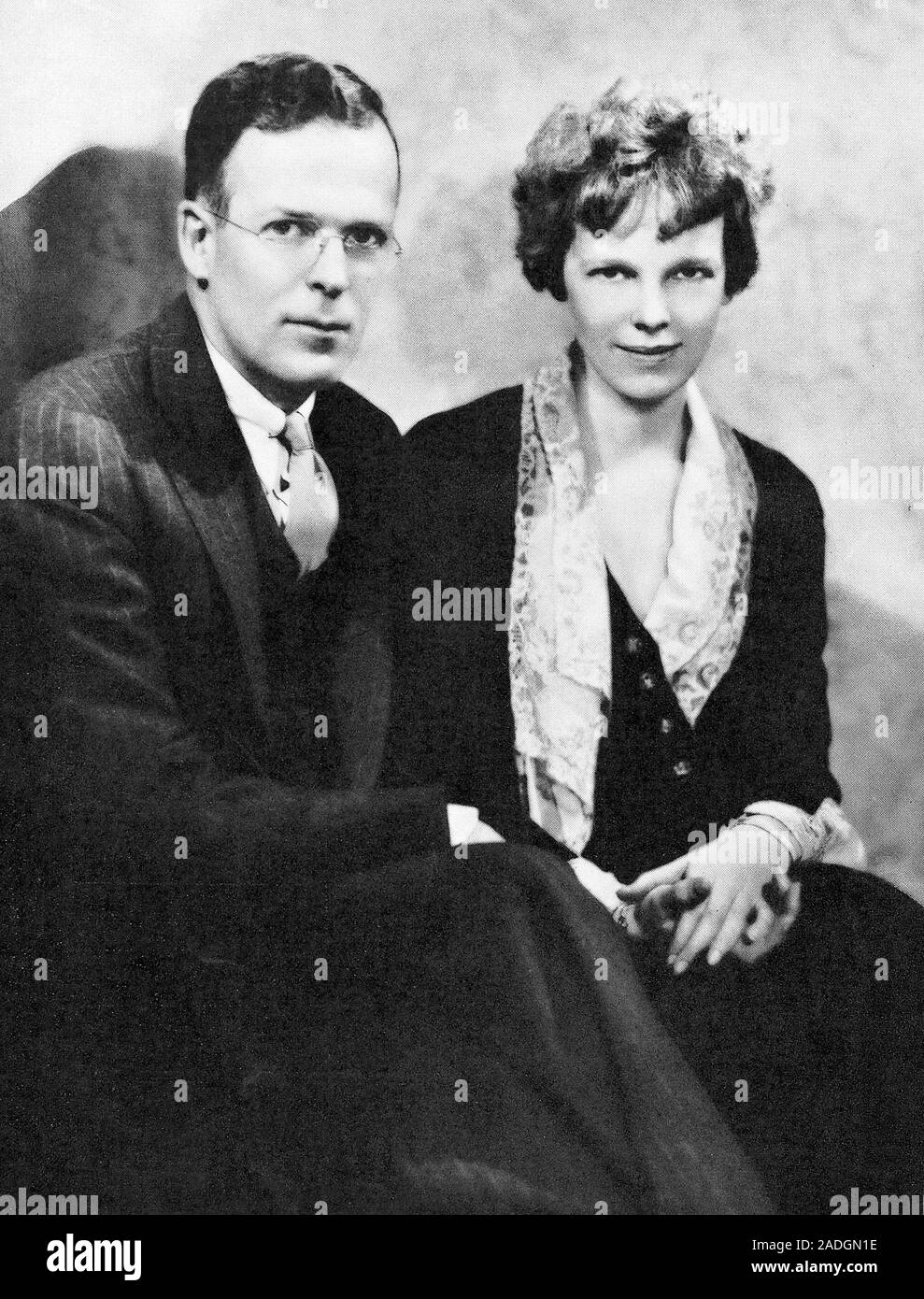 Amelia Earhart (1897-1937), American aviation pioneer. She is sitting ...