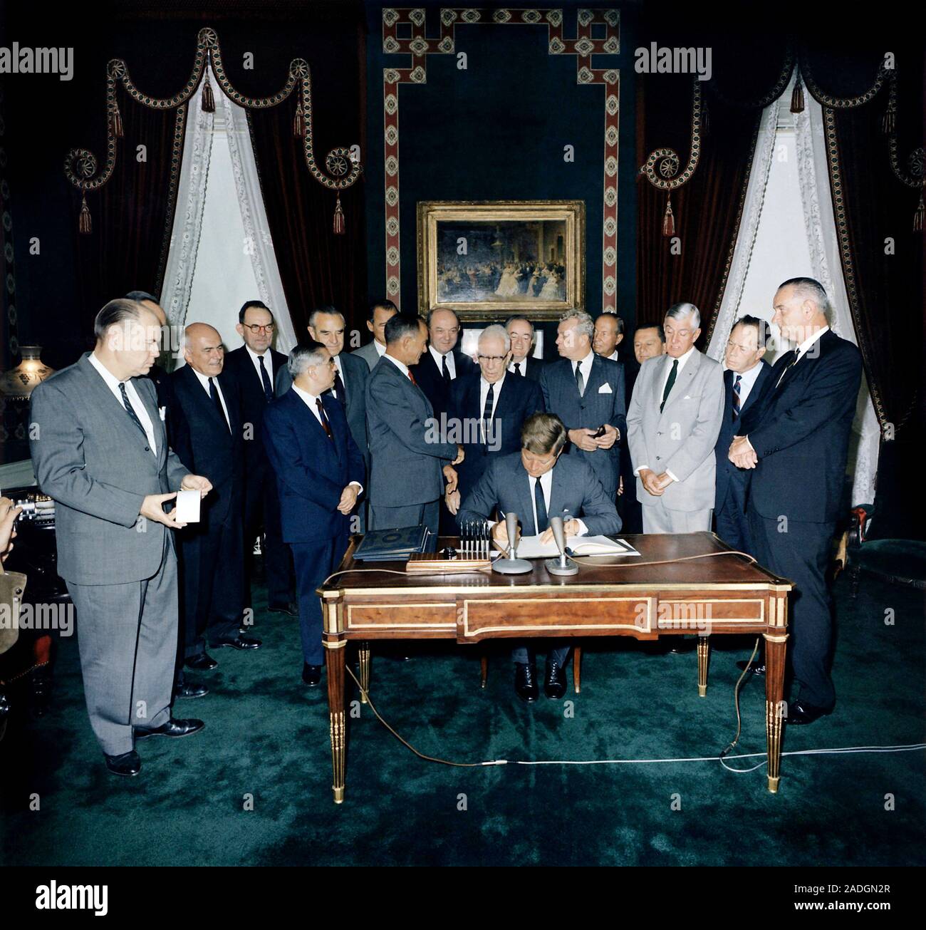 Nuclear Test Ban Treaty signing. US President John F. Kennedy (seated ...