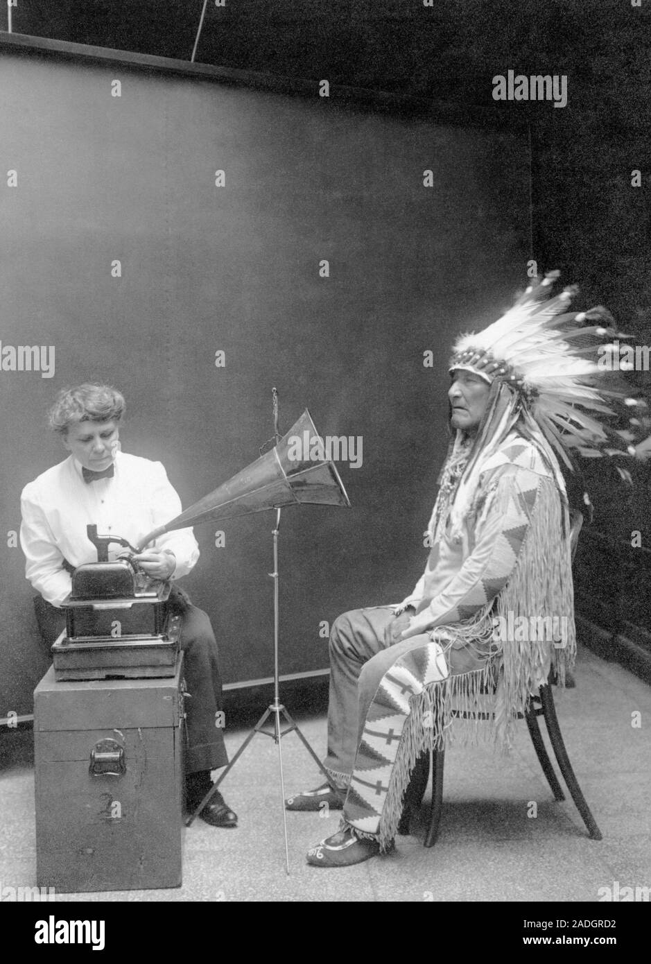 Frances Densmore (left, 1867-1957), US ethnologist, using a phonograph ...