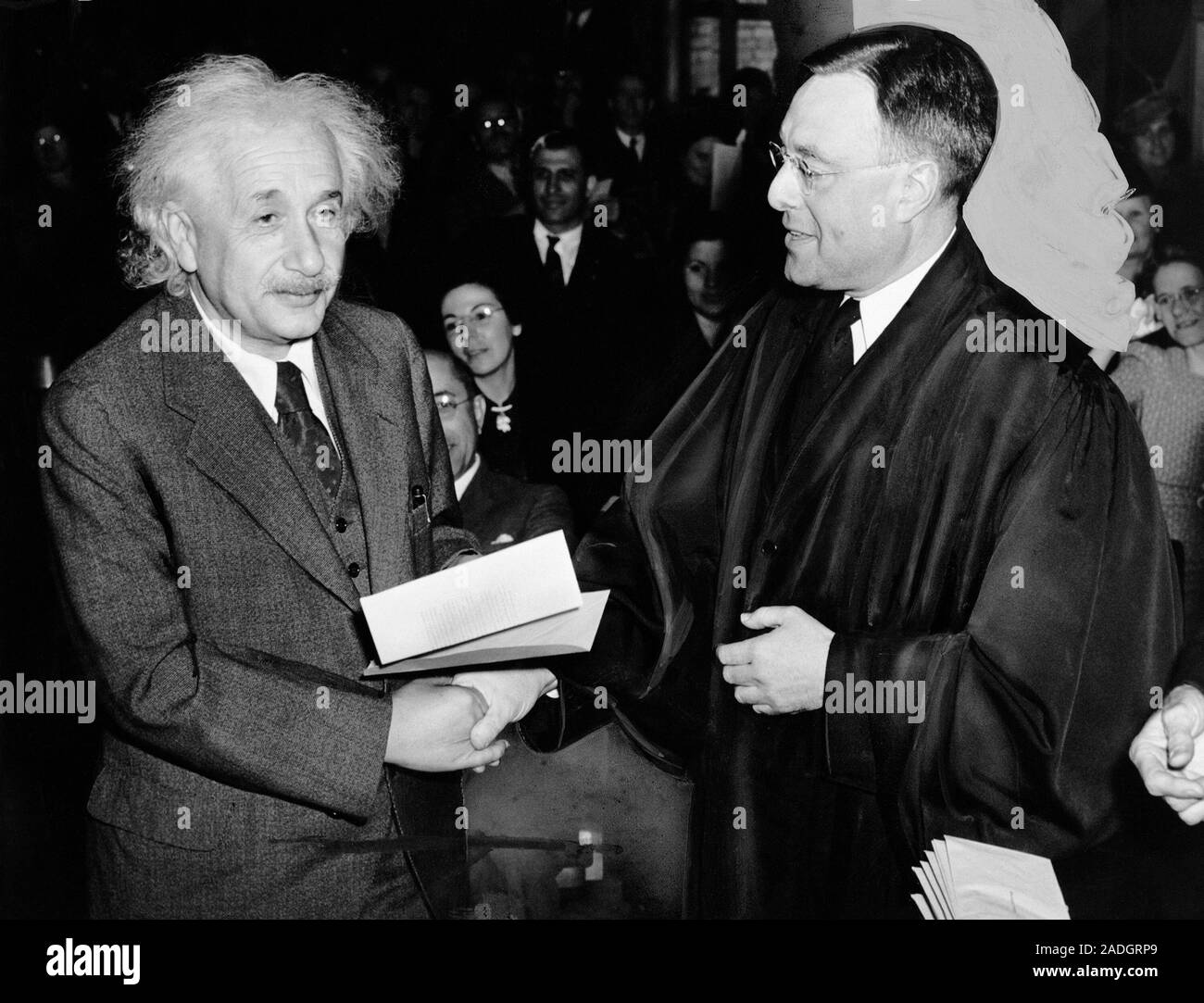 Albert Einstein (1879-1955), physicist, receiving US citizenship from ...