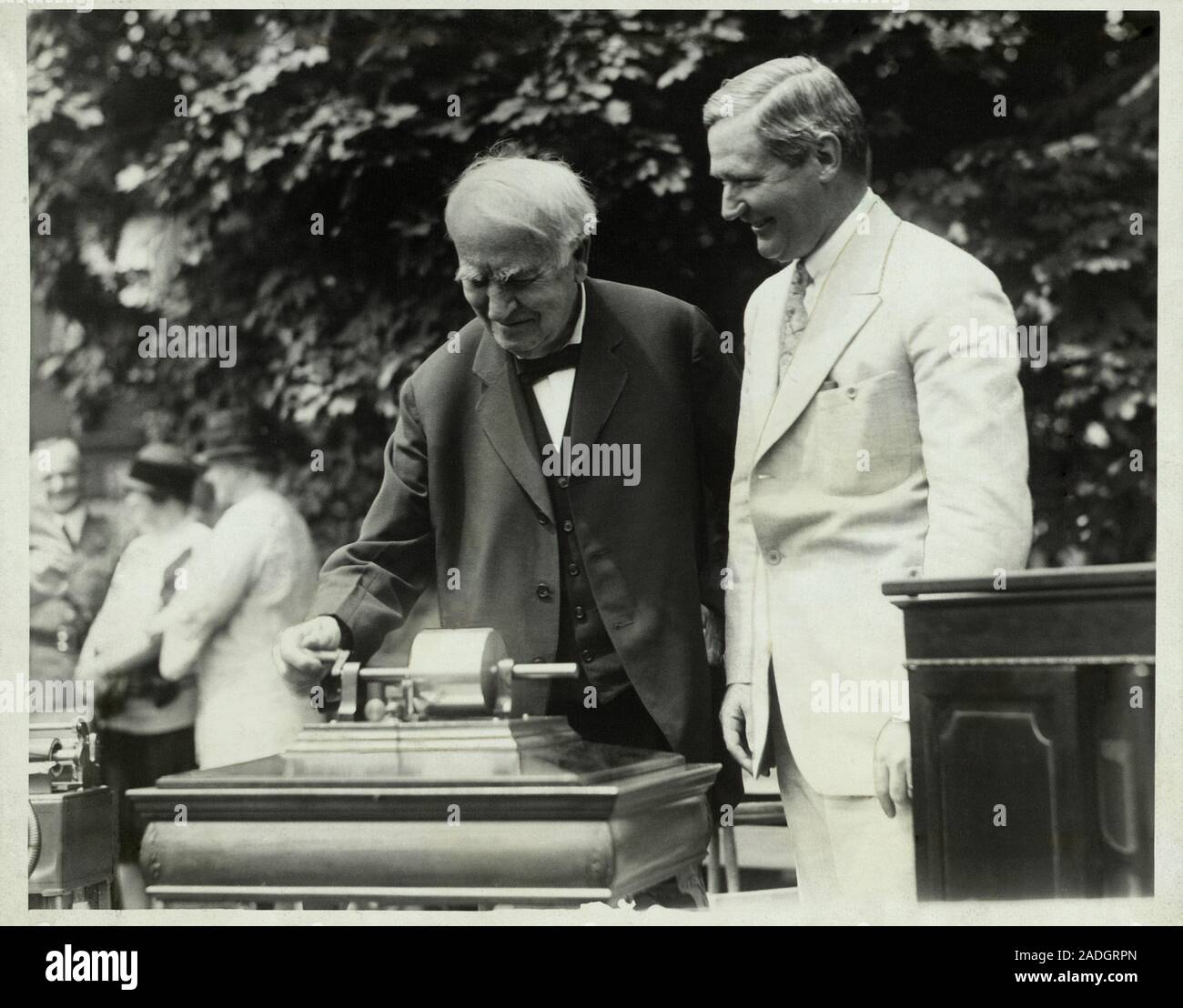 Edison and his phonograph. Thomas Alva Edison (1847-1931, centre), US ...