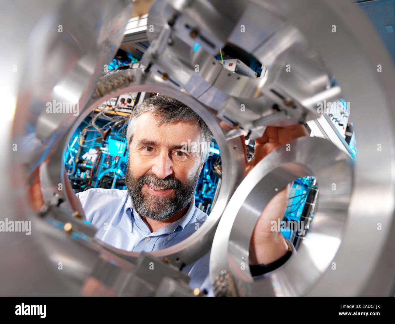 Patrick Gill, British physicist. Professor Gill looking through the ...
