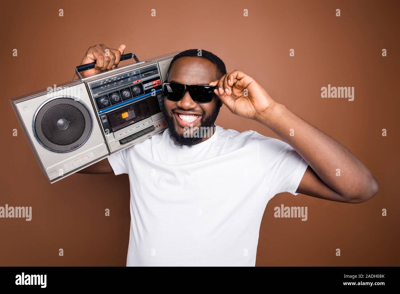 Carrying boombox hi-res stock photography and images - Alamy