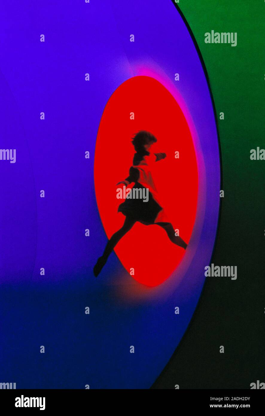 Colourscape. Visitor exploring the Colourscape, a sculpture consisting ...