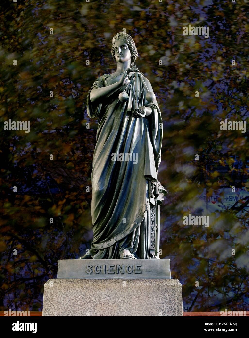 Statue of Science. Bronze statue of a woman representing Science. The ...