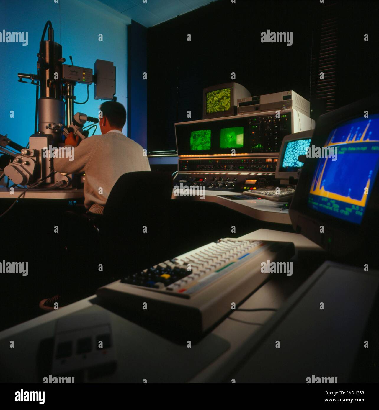 Scanning electron microscope. Researcher using a scanning electron ...