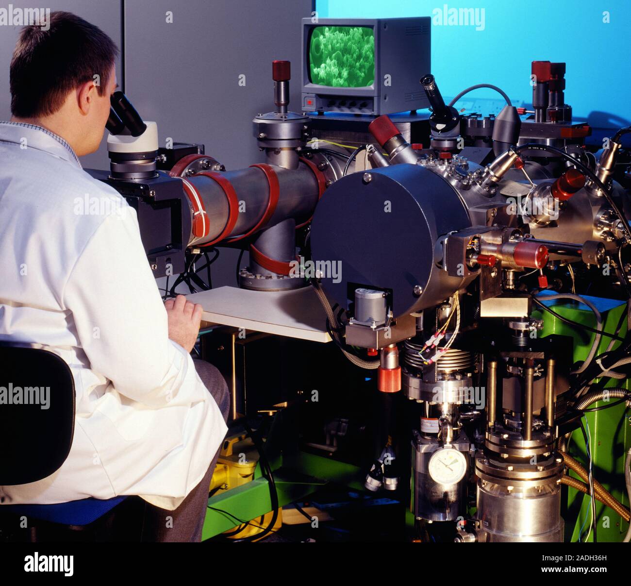 Scanning electron microscope. Researcher using a scanning electron ...