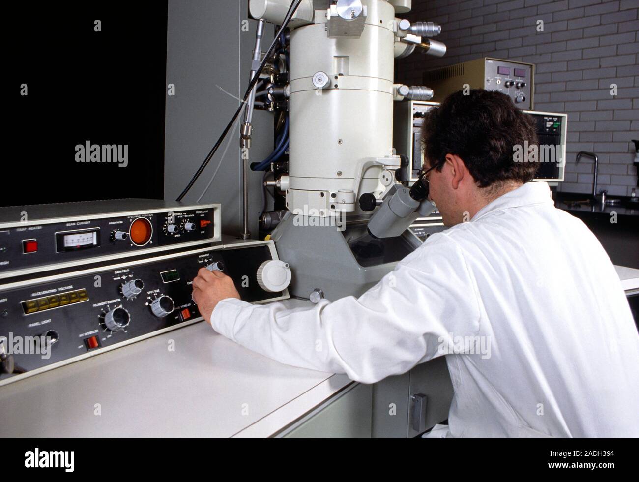 Transmission electron microscope (TEM) equipment, showing operator ...