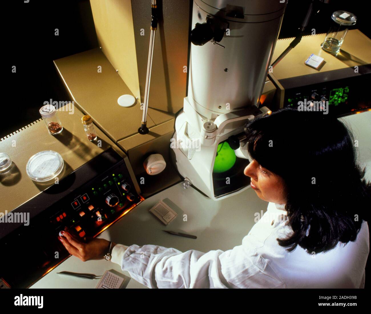 Operator using a transmission electron microscope (TEM). The operating ...