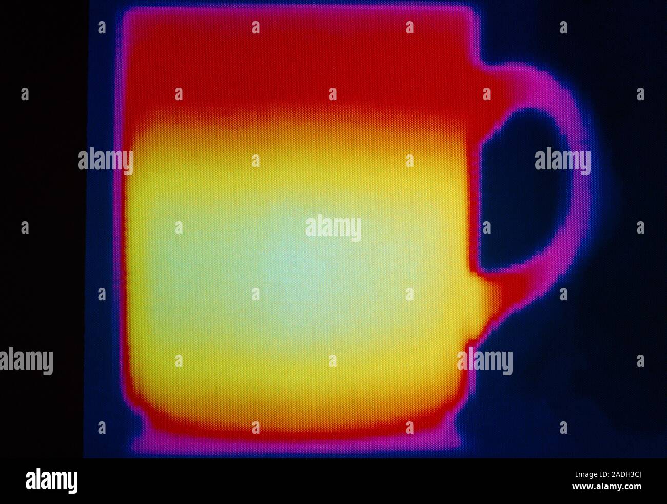 False-colour thermogram of a hot coffee mug. Thermography is an imaging ...