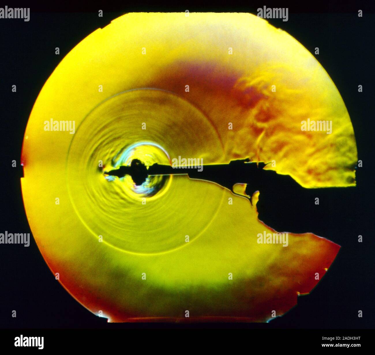 Pistol being fired, schlieren image .22 calibre pistol and its bullet ...