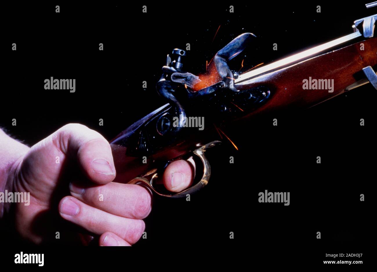 No. 1 in a series of four high-speed photographs of a flintlock pistol ...