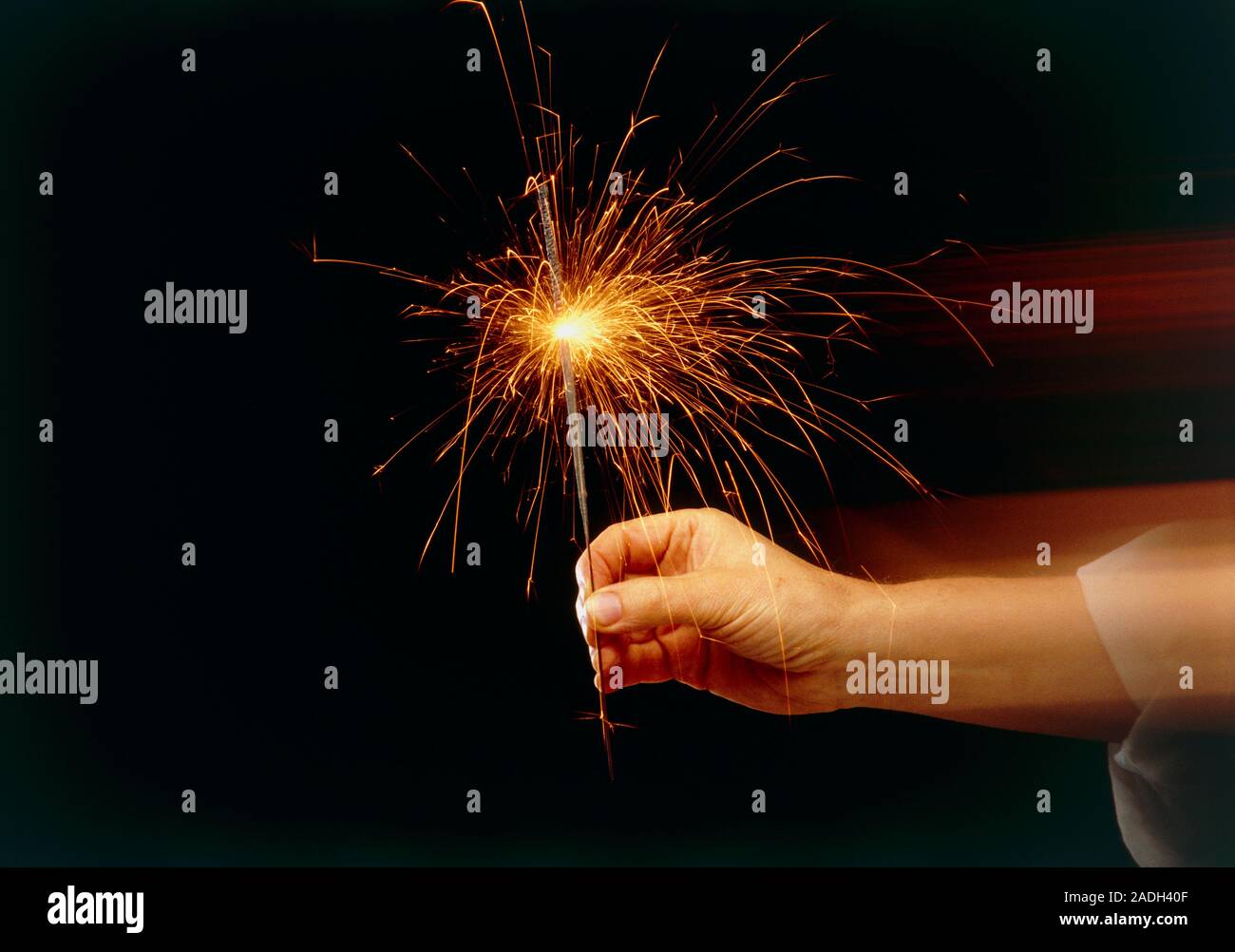 Hand-held sparkler" firework Stock Photo - Alamy
