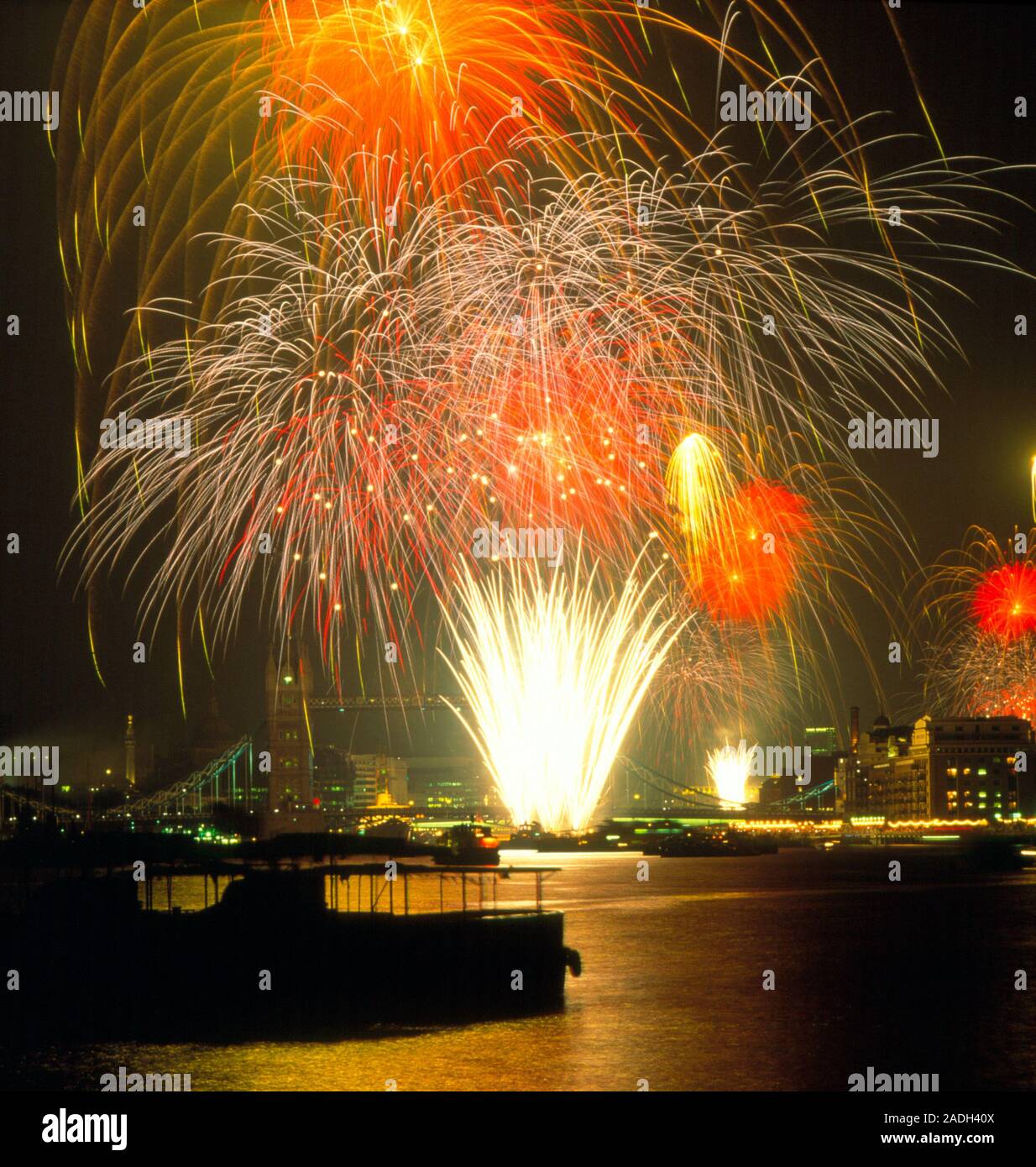 Fireworks. Multi-coloured aerial firework display at night over Tower ...
