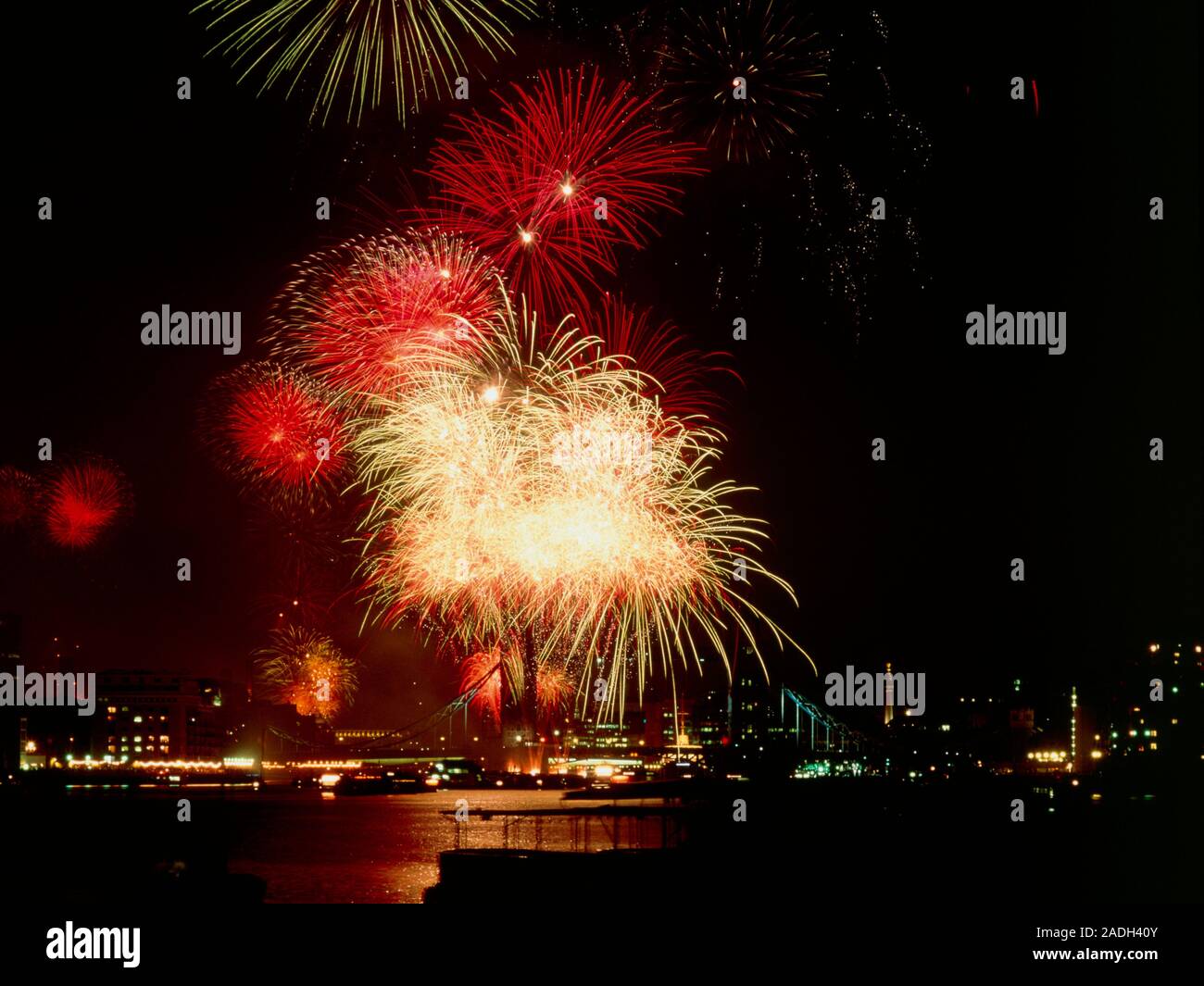 Fireworks. Multi-coloured aerial firework display at night over Tower ...
