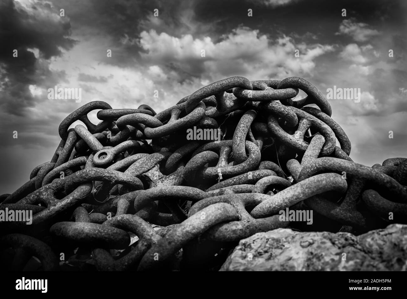 Big ship chains on cloudy background Stock Photo - Alamy