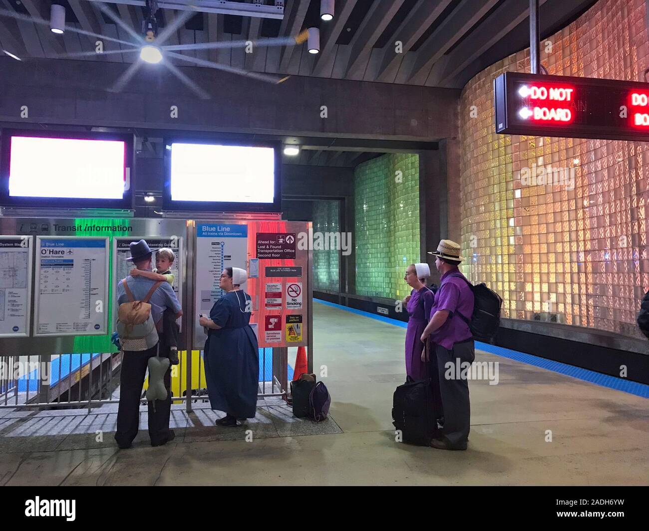 Amish family, CTA Terminal at O'Hare Airport, Chicago, Illinois. Murphy ...