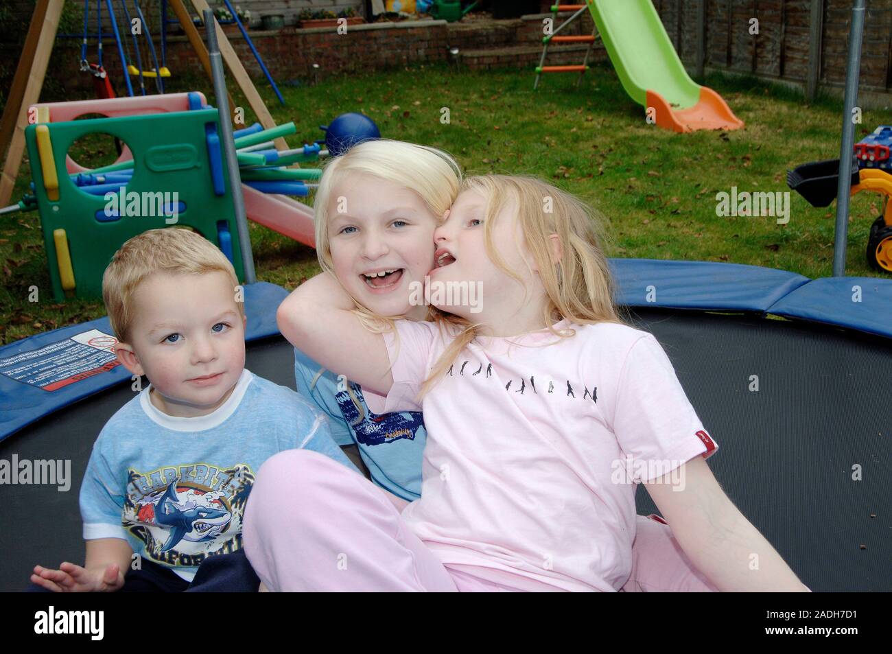 MODEL RELEASED. Angelman syndrome. 10-year-old girl (right) with ...