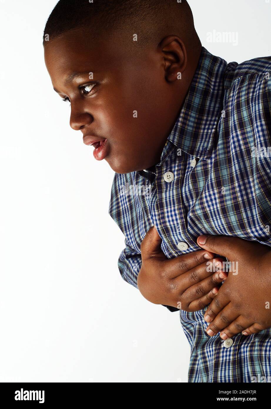 Asthma attack. Twelve-year-old boy having an asthma attack. Asthma is a ...