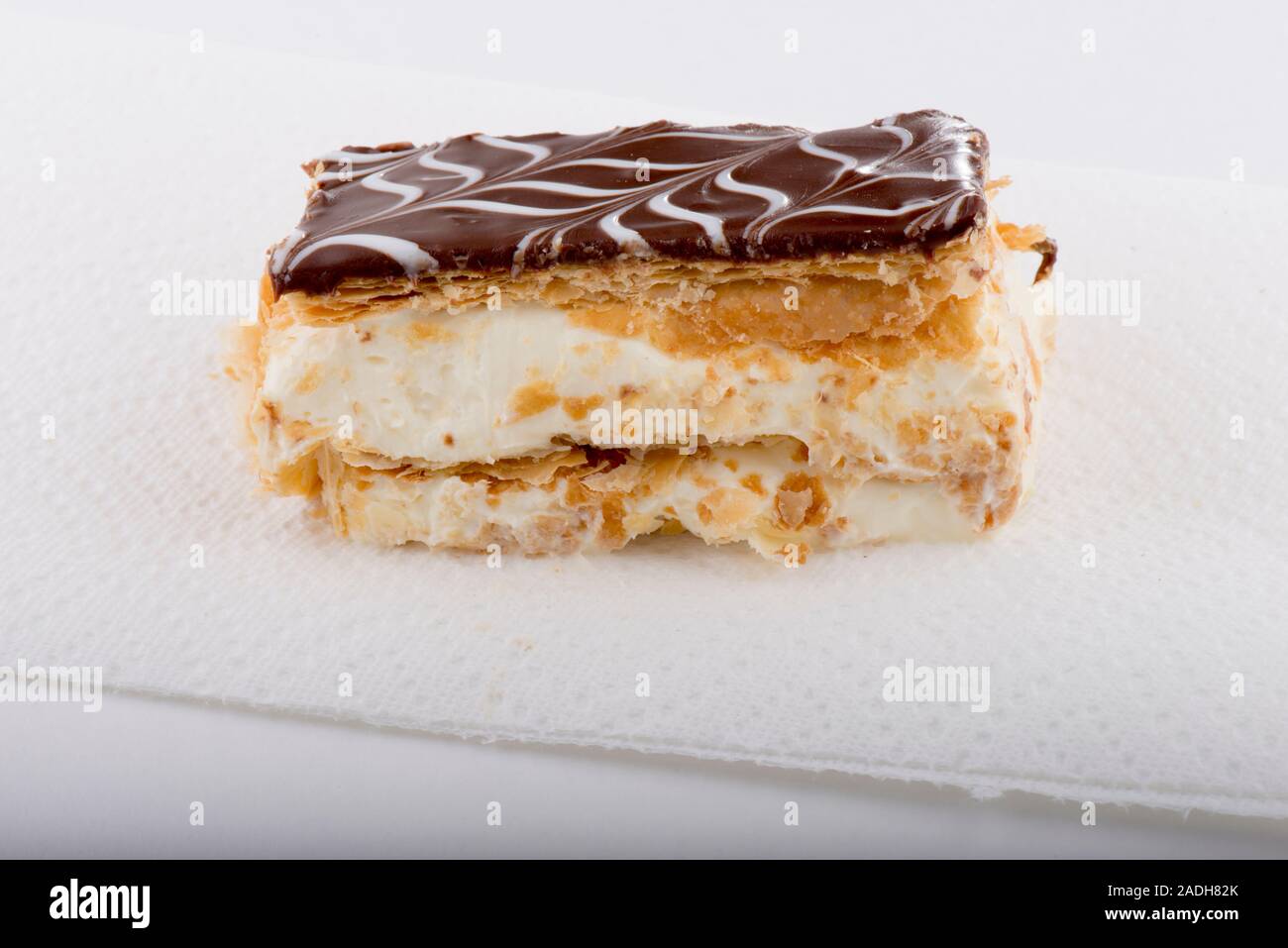 Sweet Cream Filled Pastry with Chocolate Frosting Stock Photo - Alamy