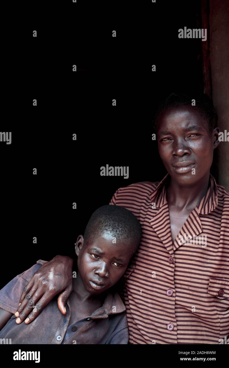 Mother and HIV-positive child. The child is infected with the human ...
