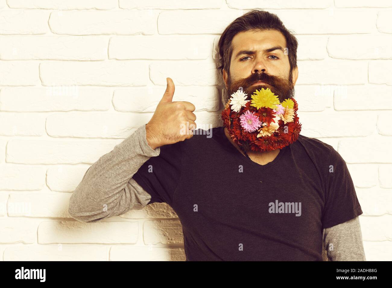 handsome bearded man with stylish mustache and shirt with colorful ...