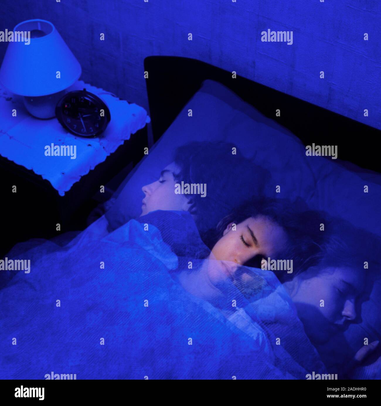 Model released: Insomnia: multiple-exposure shot of a restless woman ...