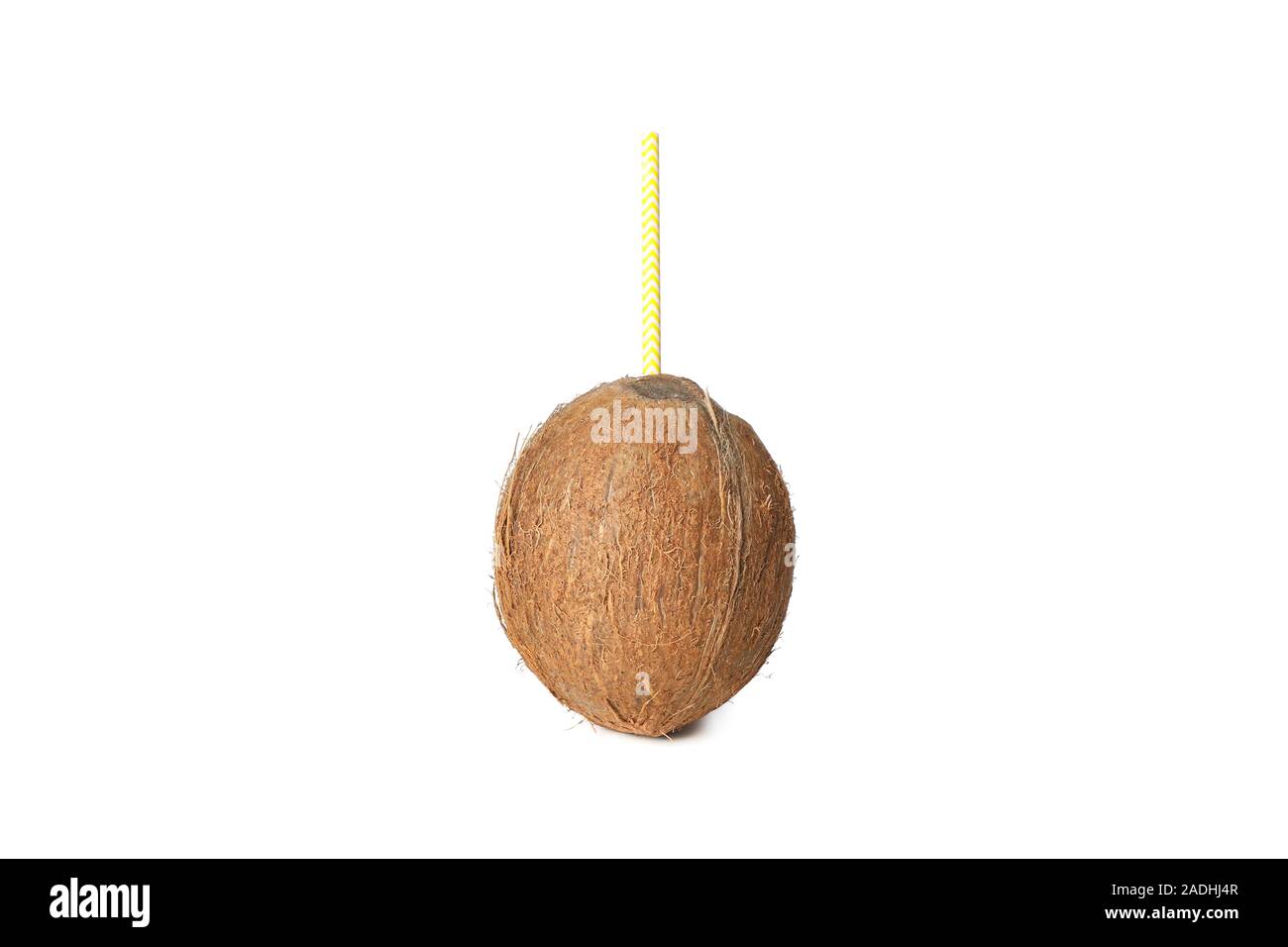 Coconut with straw isolated on white background Stock Photo - Alamy