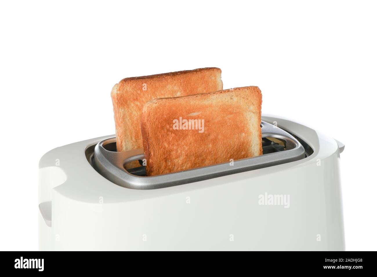 Toaster with bread slices isolated on white background Stock Photo - Alamy