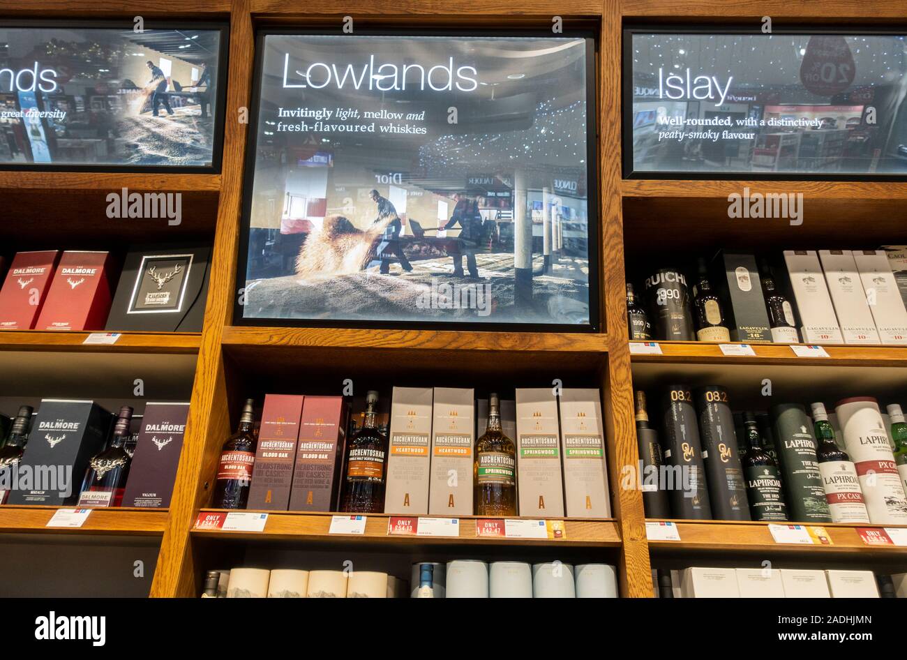 Whisky display in airport duty free shop Stock Photo - Alamy