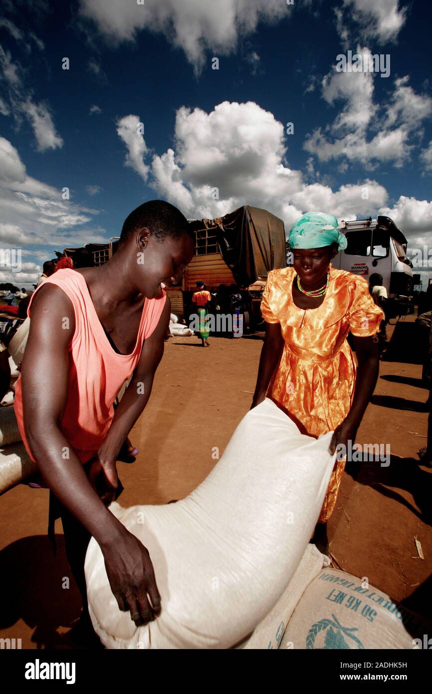 MODEL RELEASED. Food distribution at a rural village in the Gulu region ...