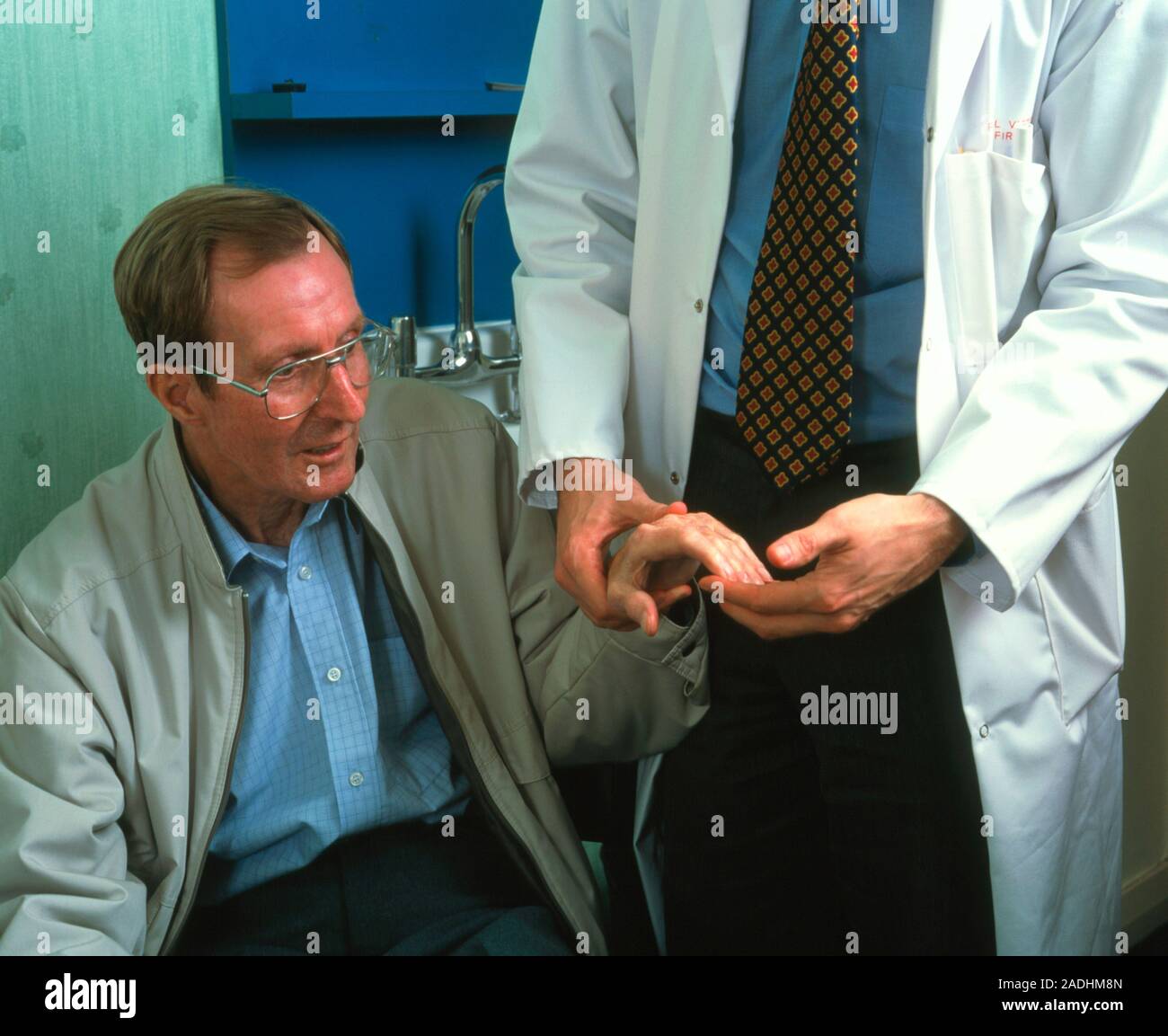 Parkinson's disease patient. Hand of an elderly man with Parkinson's ...