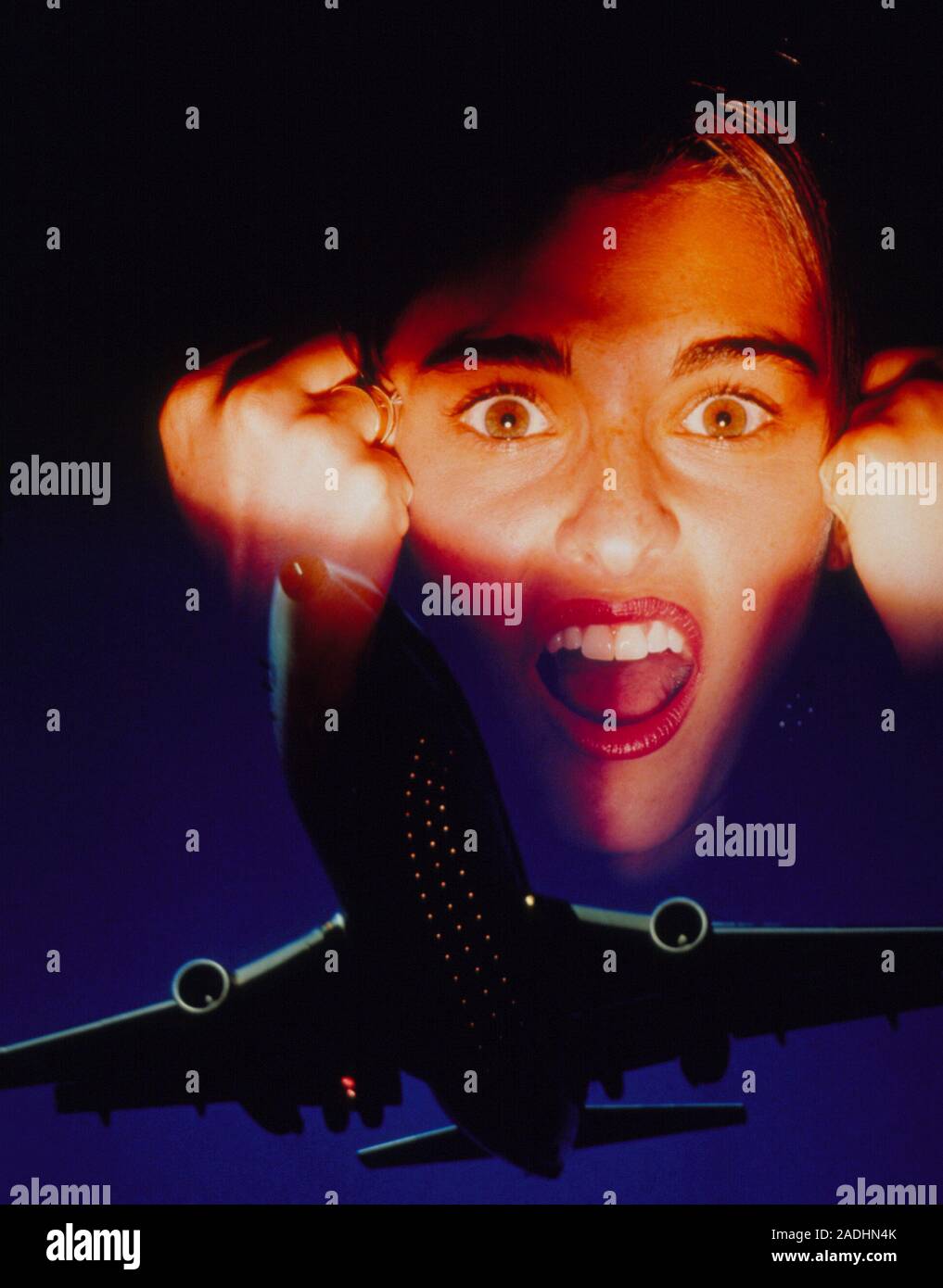 Phobia of flying. Abstract image of the face of a anxious woman ...