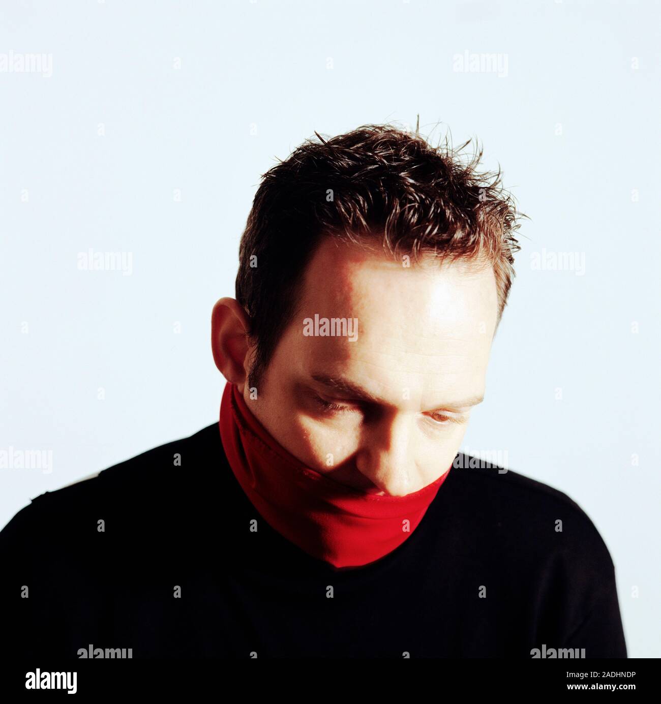 Gagged man. Conceptual image of a man wearing a gag. This could ...